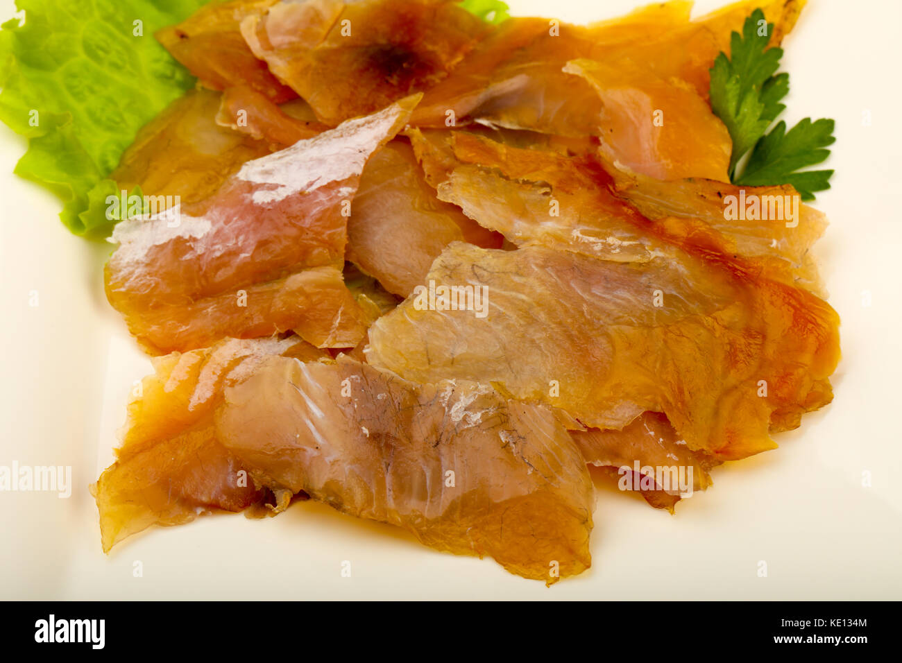 Smoked catfish fillet carpaccio Stock Photo - Alamy