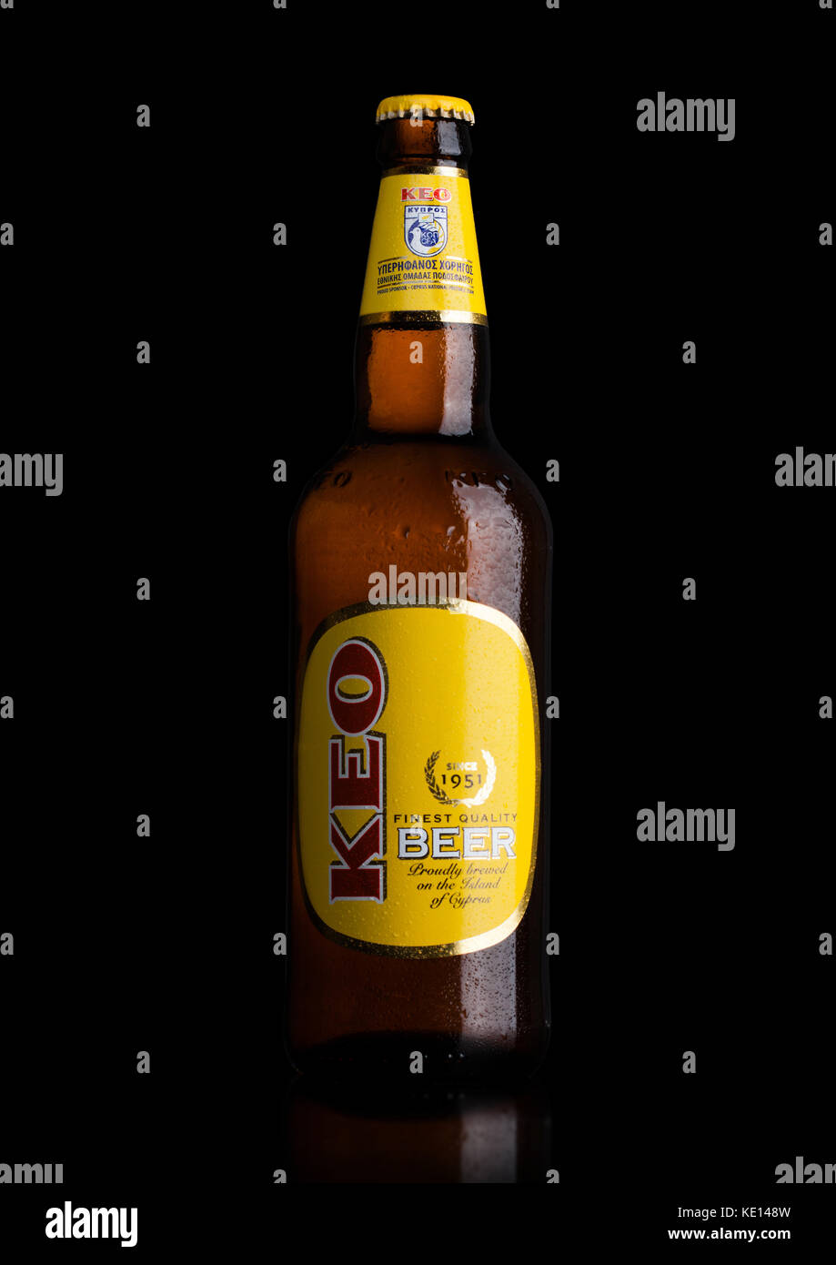 LONDON, UK - MAY 15, 2017: Bottle of KEO lager beer on black background ...
