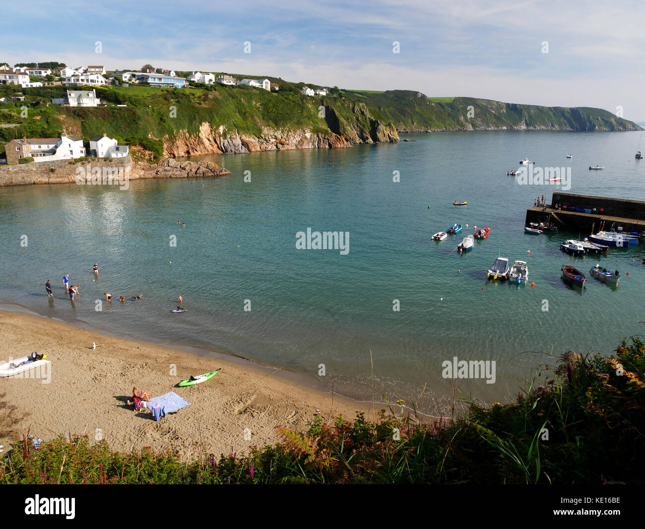 A view of the beach and harbour at Gorran Haven, Cornwall Stock Photo ...
