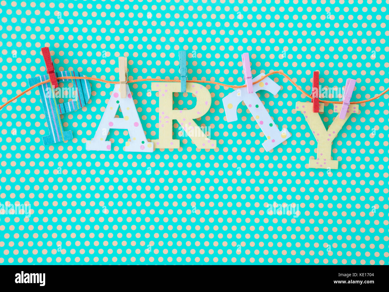 Colorful PARTY banner on blue and yellow polka dots Stock Photo - Alamy