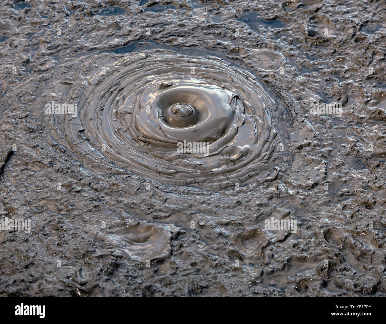 Close-up of a bubbling mud pool, in the Waiotapu active geothermal area ...