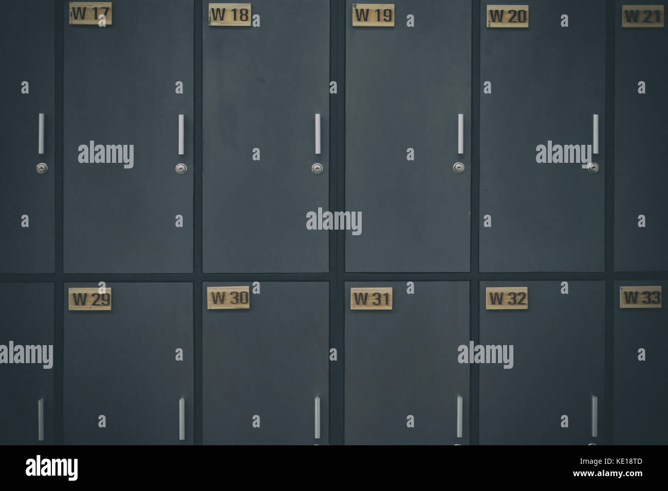 gray locker in gym. metal cabinet school with handle and lock. texture ...