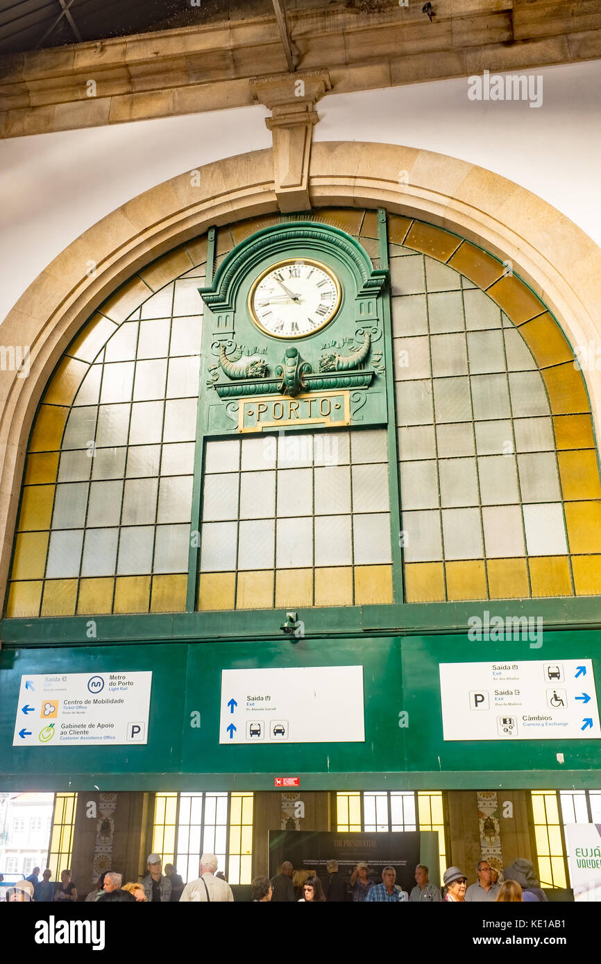 Clock in the station at Porto Stock Photo - Alamy