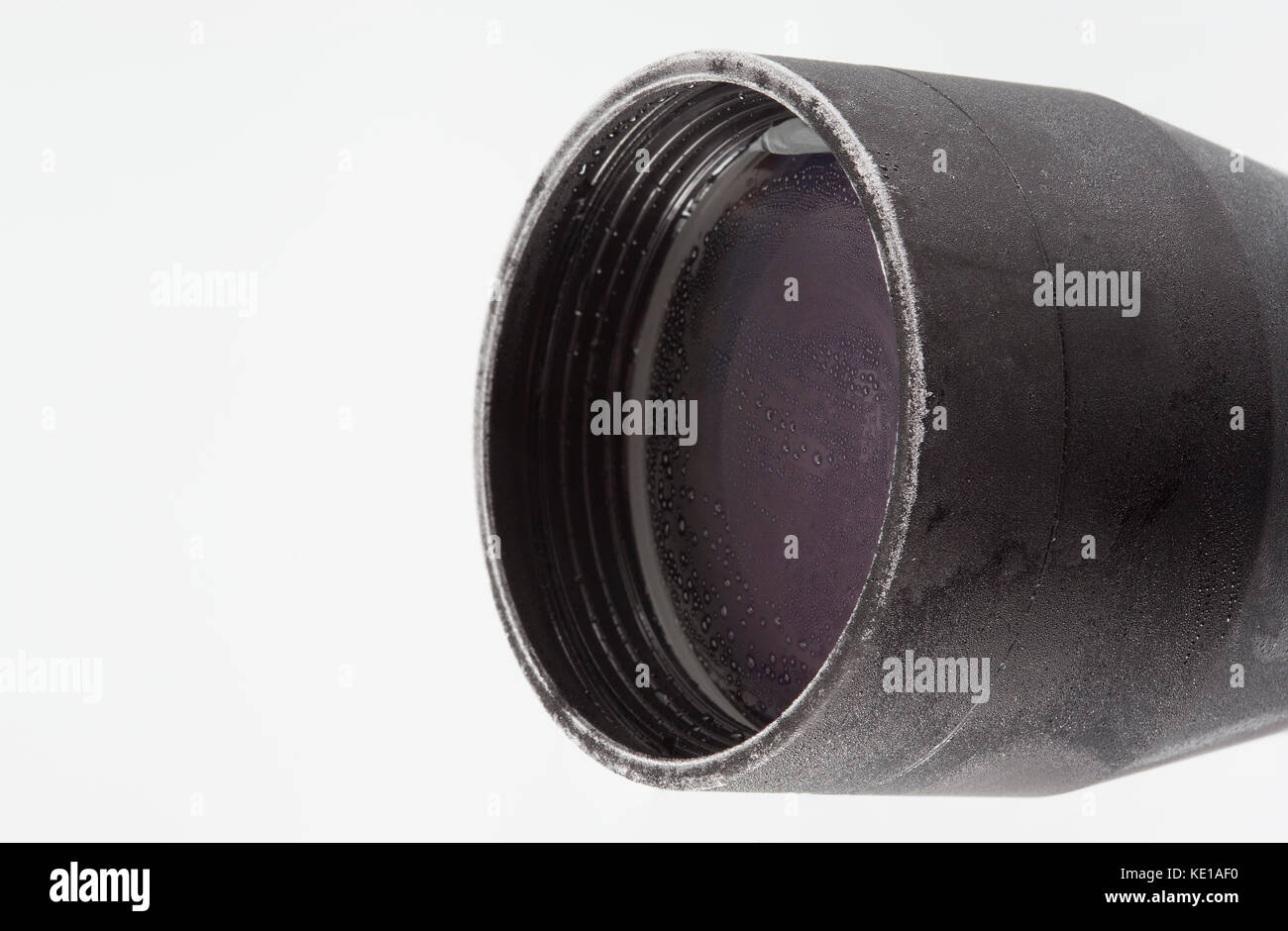 Objective lens on a rifle scope covered in frost and water Stock Photo ...