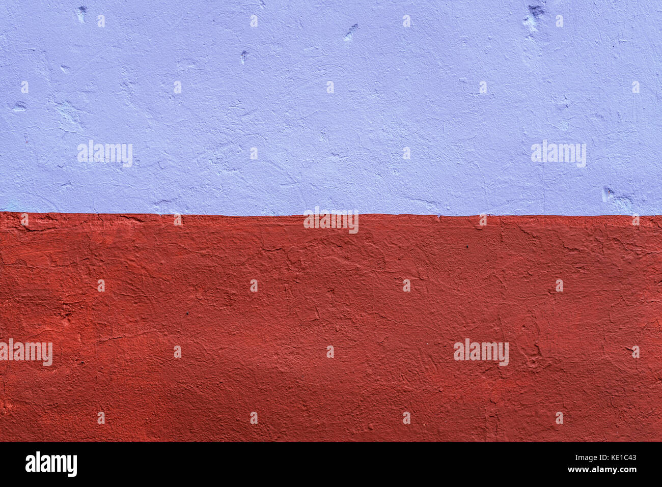 The homogeneous background of the wall is dyed with a brown and purple ...