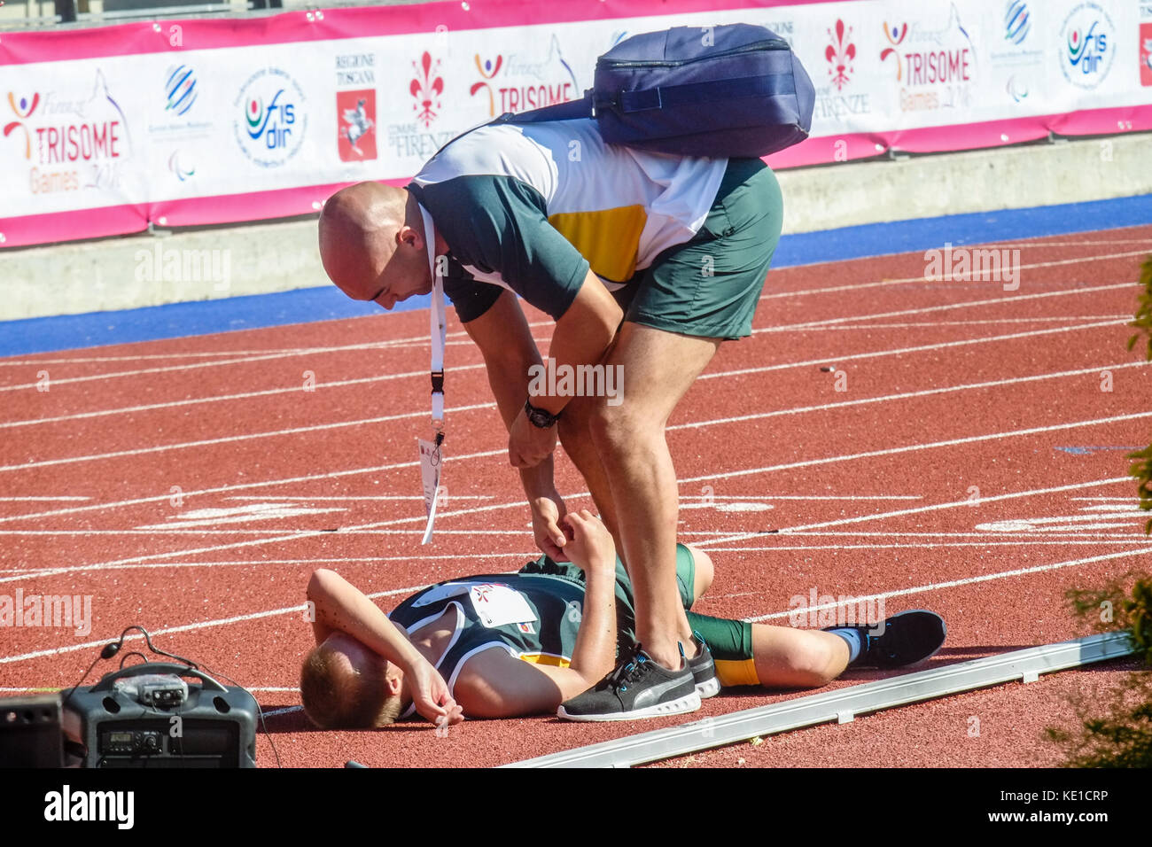 Down syndrome italian athlete tired after his perfomance as runners ...