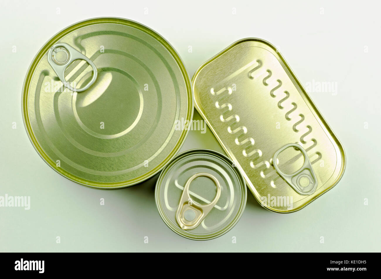 Close-up view of various tins and cans on white background Stock Photo ...