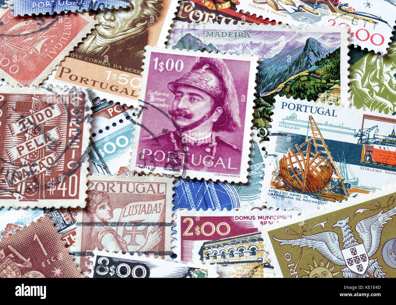 Cancelled postage stamps printed by Portugal, that show different people and motives from ...