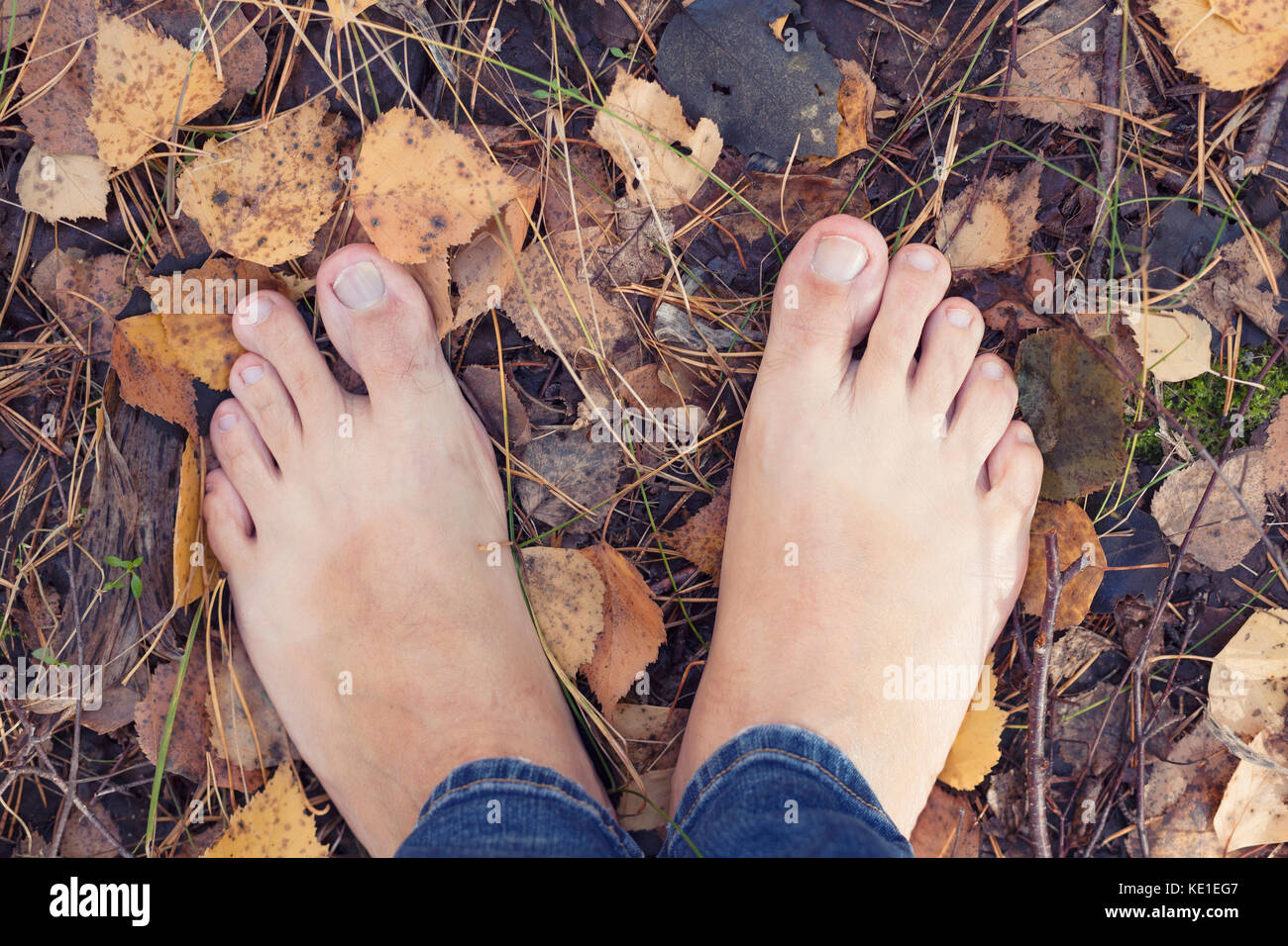 Feet Standing On Ground