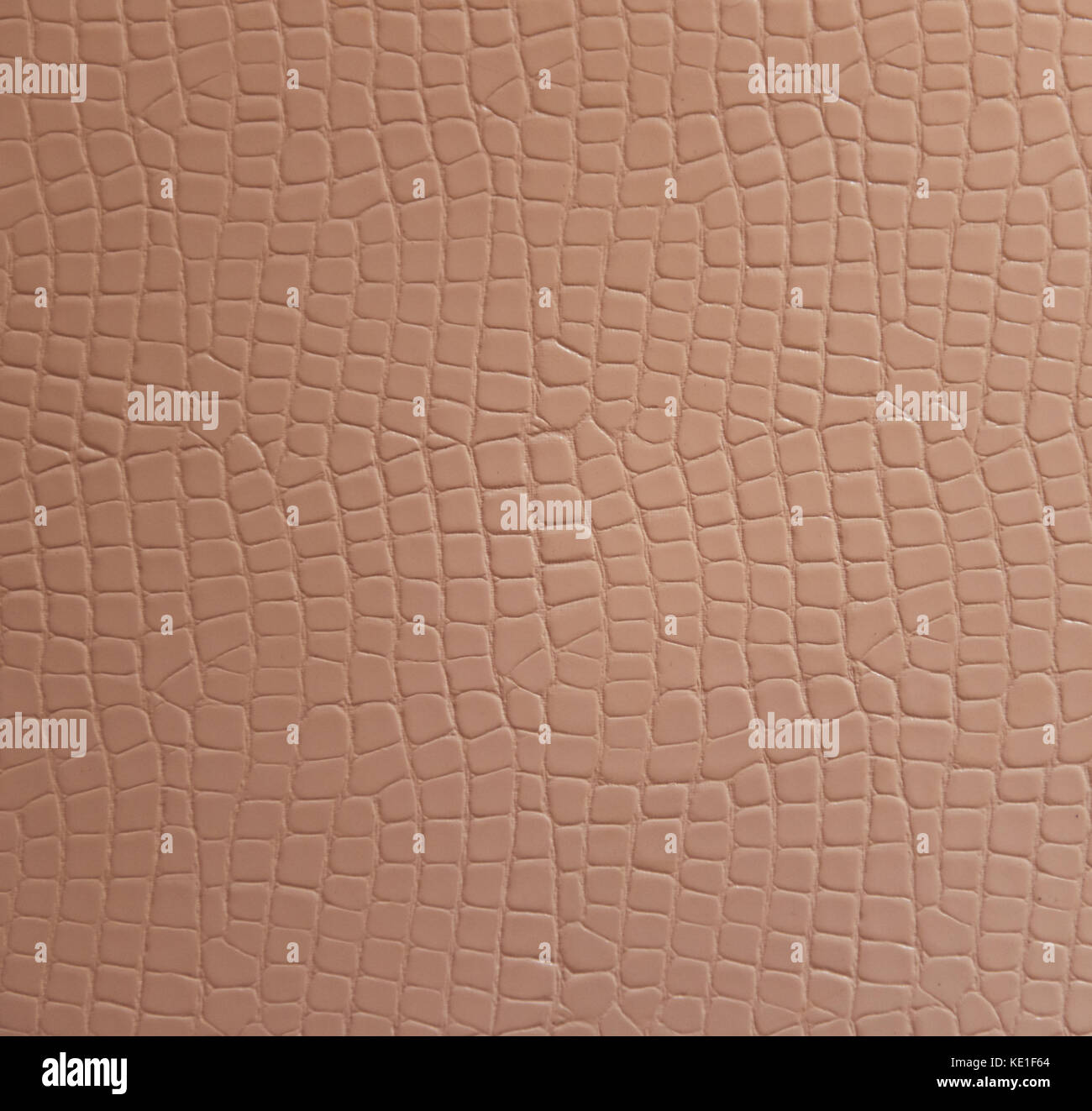Texture of a beige leatherette close-up Stock Photo - Alamy