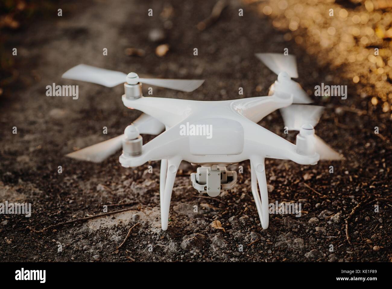 Starting white drone quadcopter with camera Stock Photo - Alamy