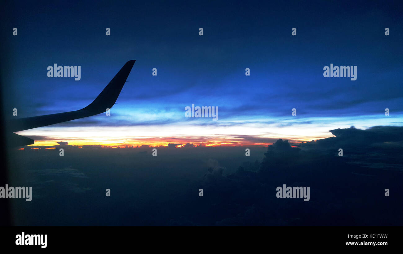 Sunset From My Flight Stock Photo - Alamy