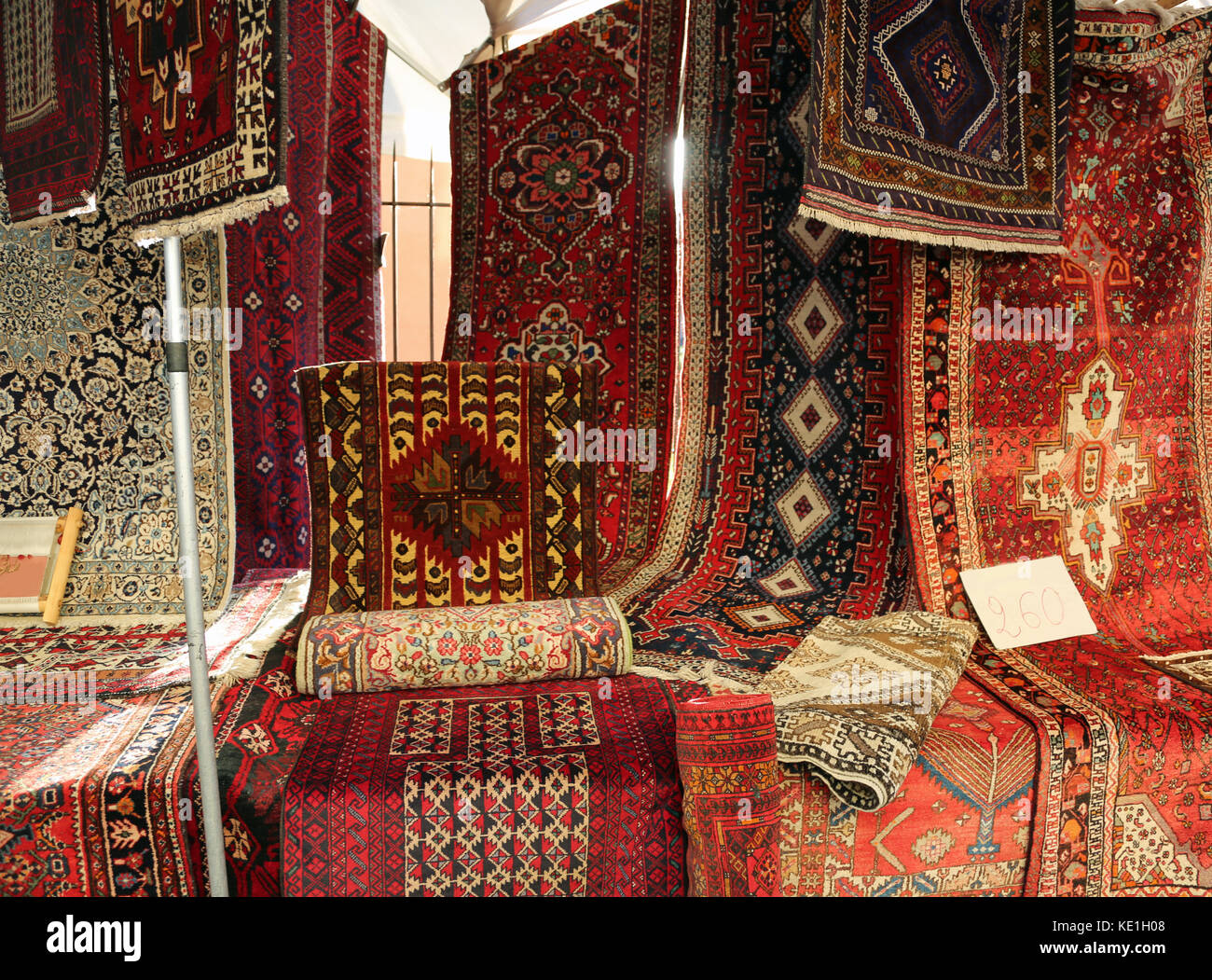 Stall of Asian and North African carpet for sale Stock Photo - Alamy