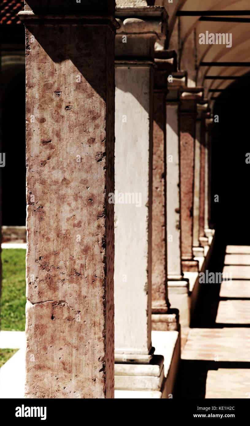 long colonnade of a cloister in the ancient convent of friars Stock ...