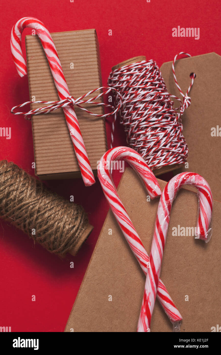Festive Christmas present with candy cane on a red background Stock ...
