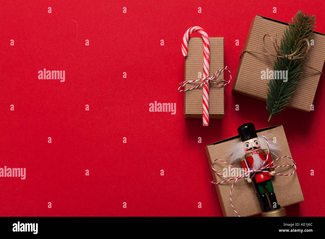 Festive Christmas presents on a red background Stock Photo - Alamy