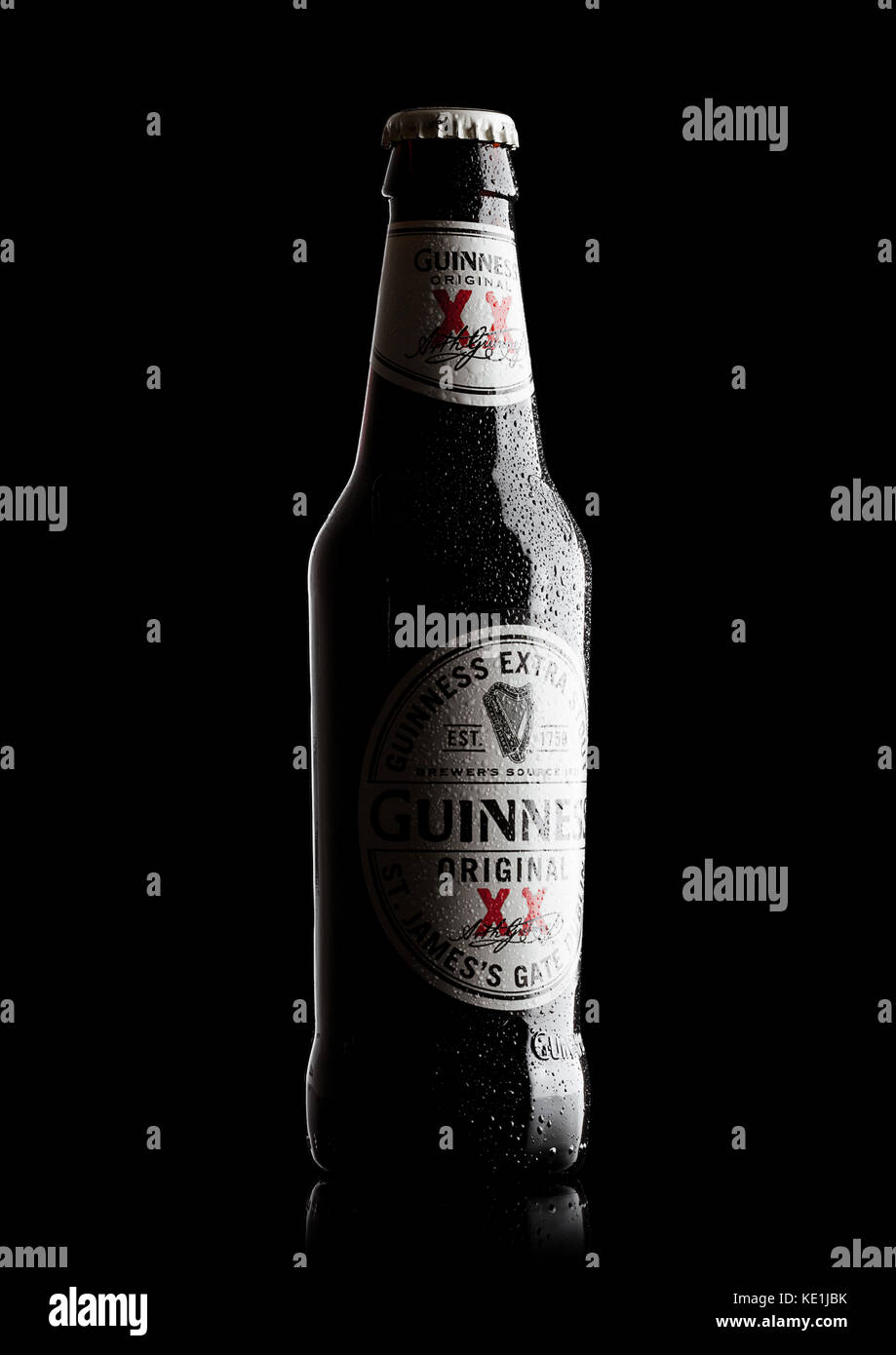 LONDON, UK - OCTOBER 15, 2017: Guinness extra stout beer bottle on ...