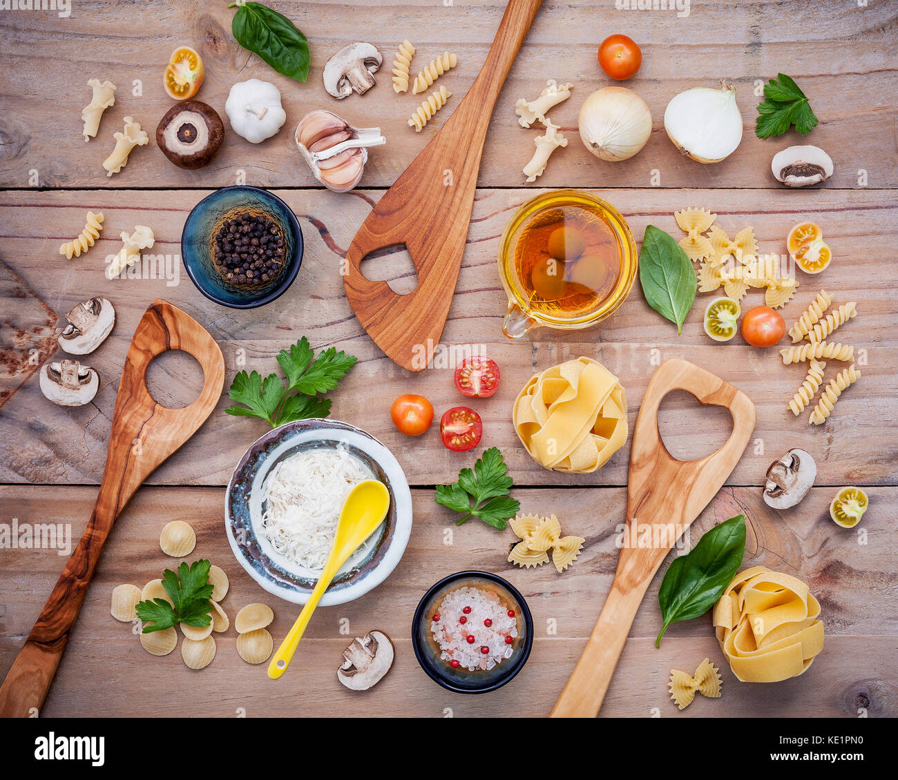 Italian foods concept and menu design. Fettuccine with wooden spatula ...