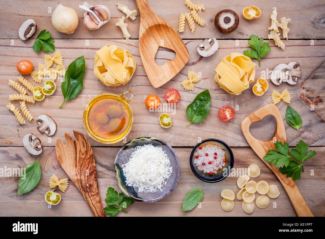 Italian foods concept and menu design. Fettuccine with wooden spatula ...