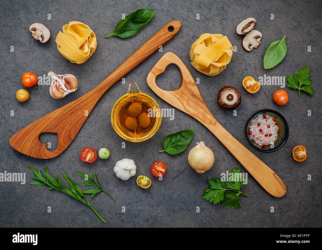 Italian foods concept and menu design. Fettuccine with wooden spatula ...