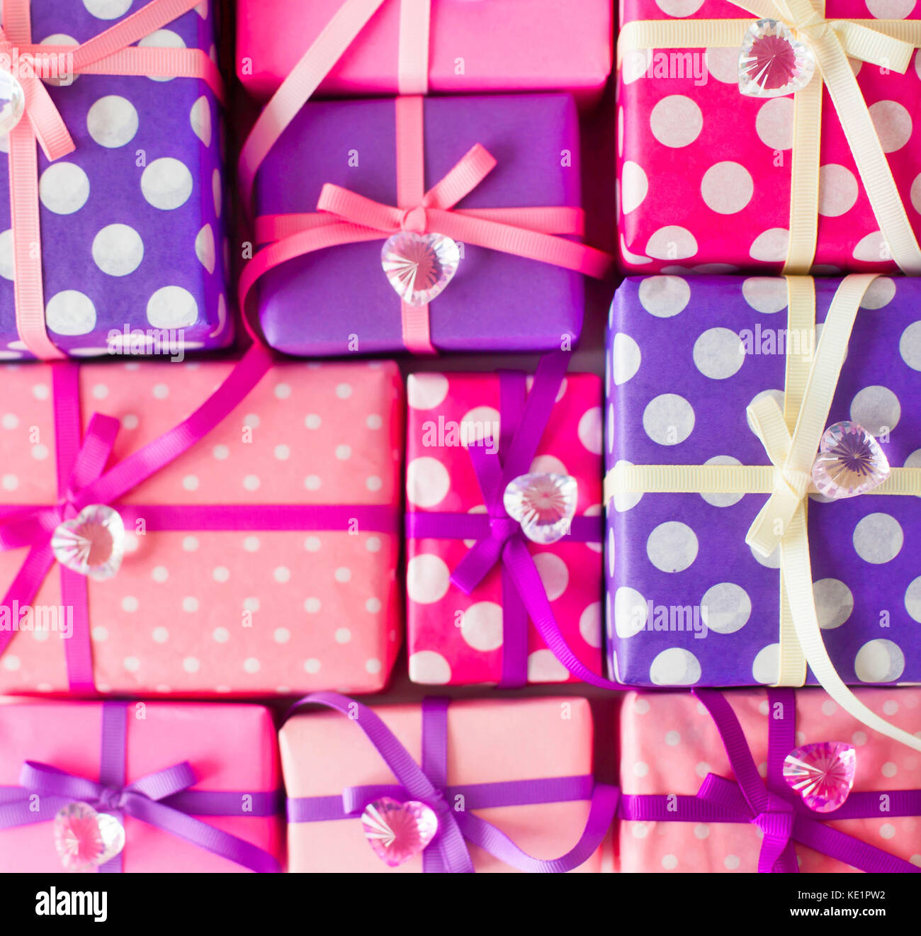 Colored gift boxes with colorful ribbons. white background. Gifts for ...