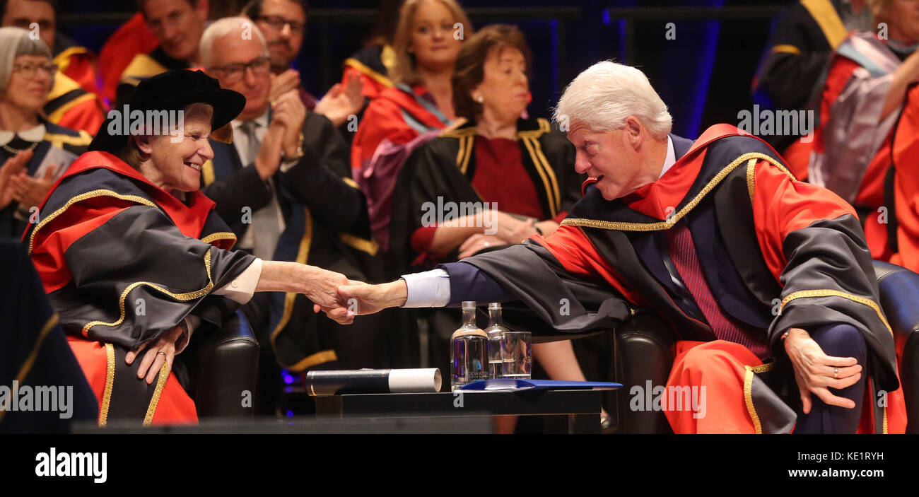 Former US president Bill Clinton (right) shakes hands with Sister ...