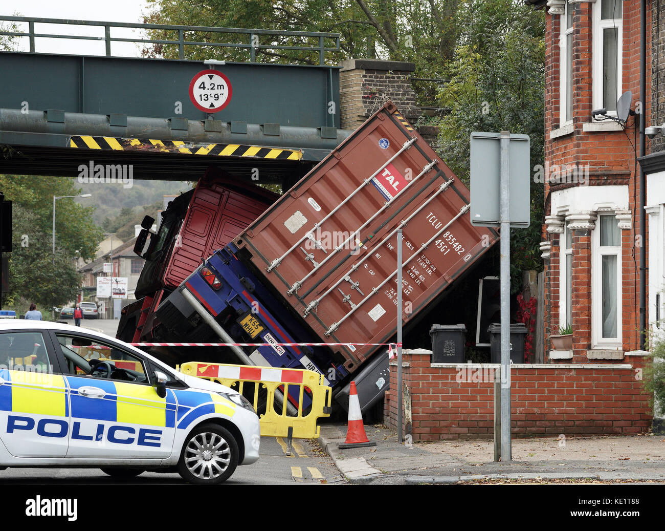 An articulated lorry which hit a bridge in Coombe Valley Road, Dover ...