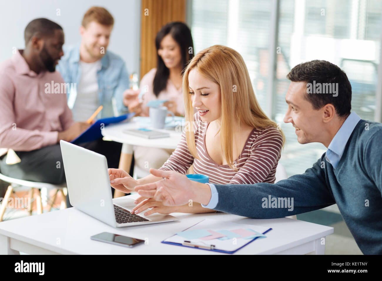 Concentrated woman typing text for presentation Stock Photo - Alamy