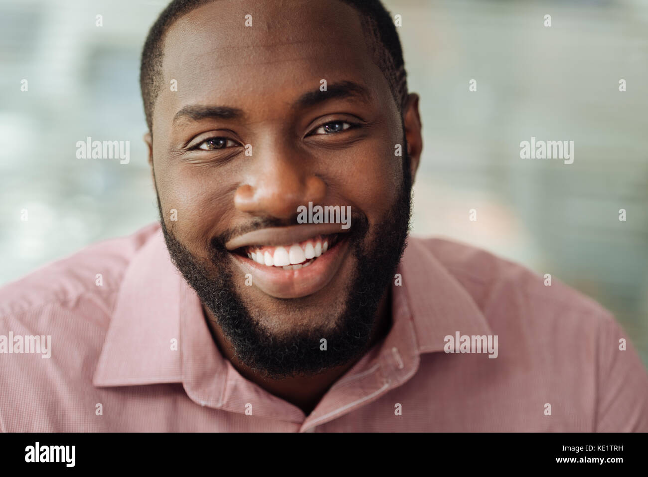Positive delighted bearded man looking forward Stock Photo - Alamy