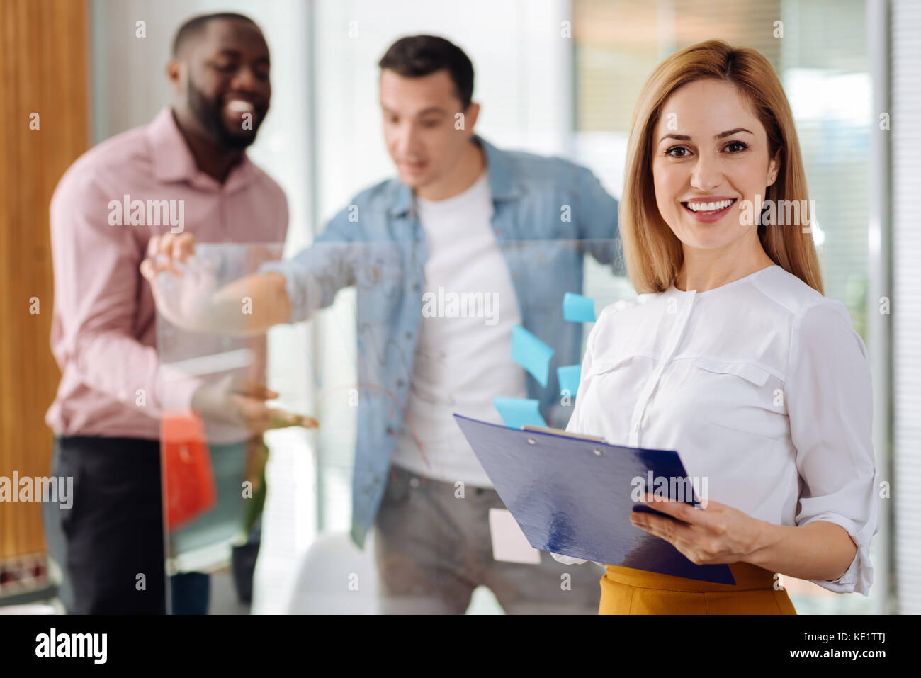 Pretty female person posing on camera Stock Photo - Alamy
