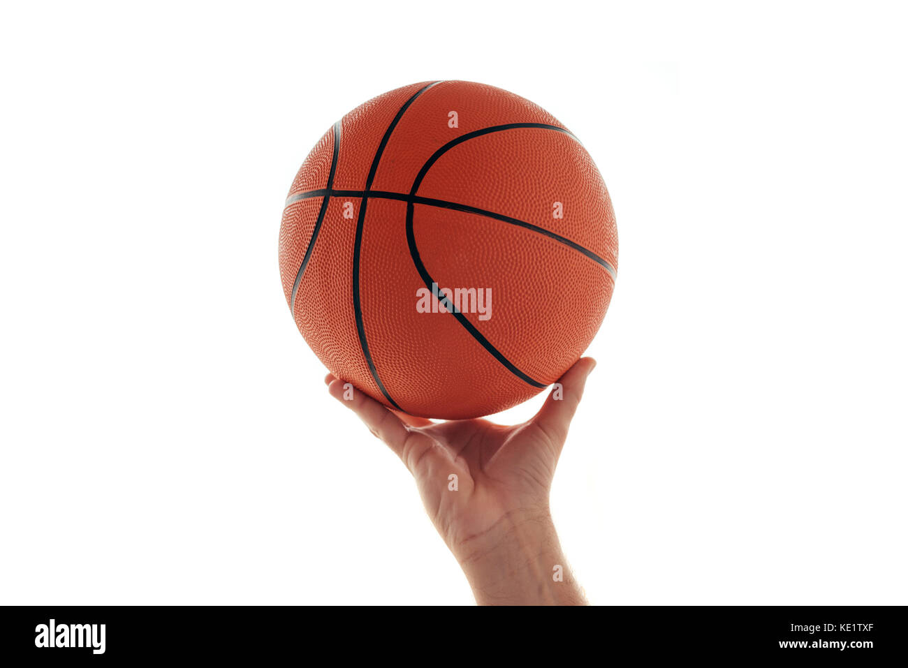 Male hand with basketball isolated on white background. Man holding ...