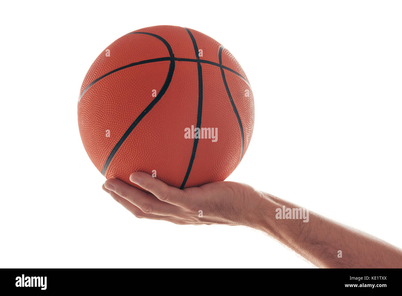 Hand holding basketball hi-res stock photography and images - Alamy