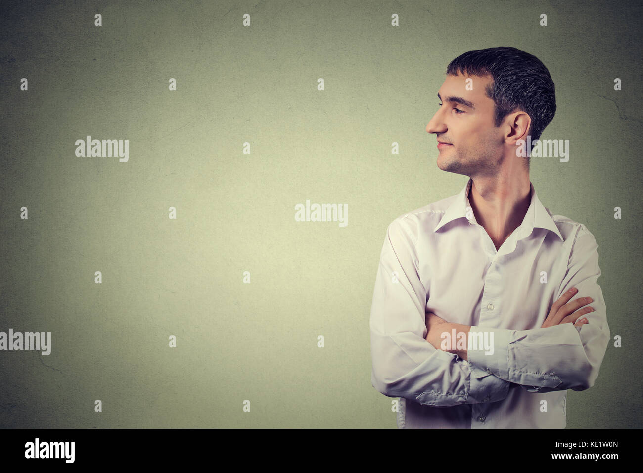 Side profile of handsome man on gray background Stock Photo - Alamy