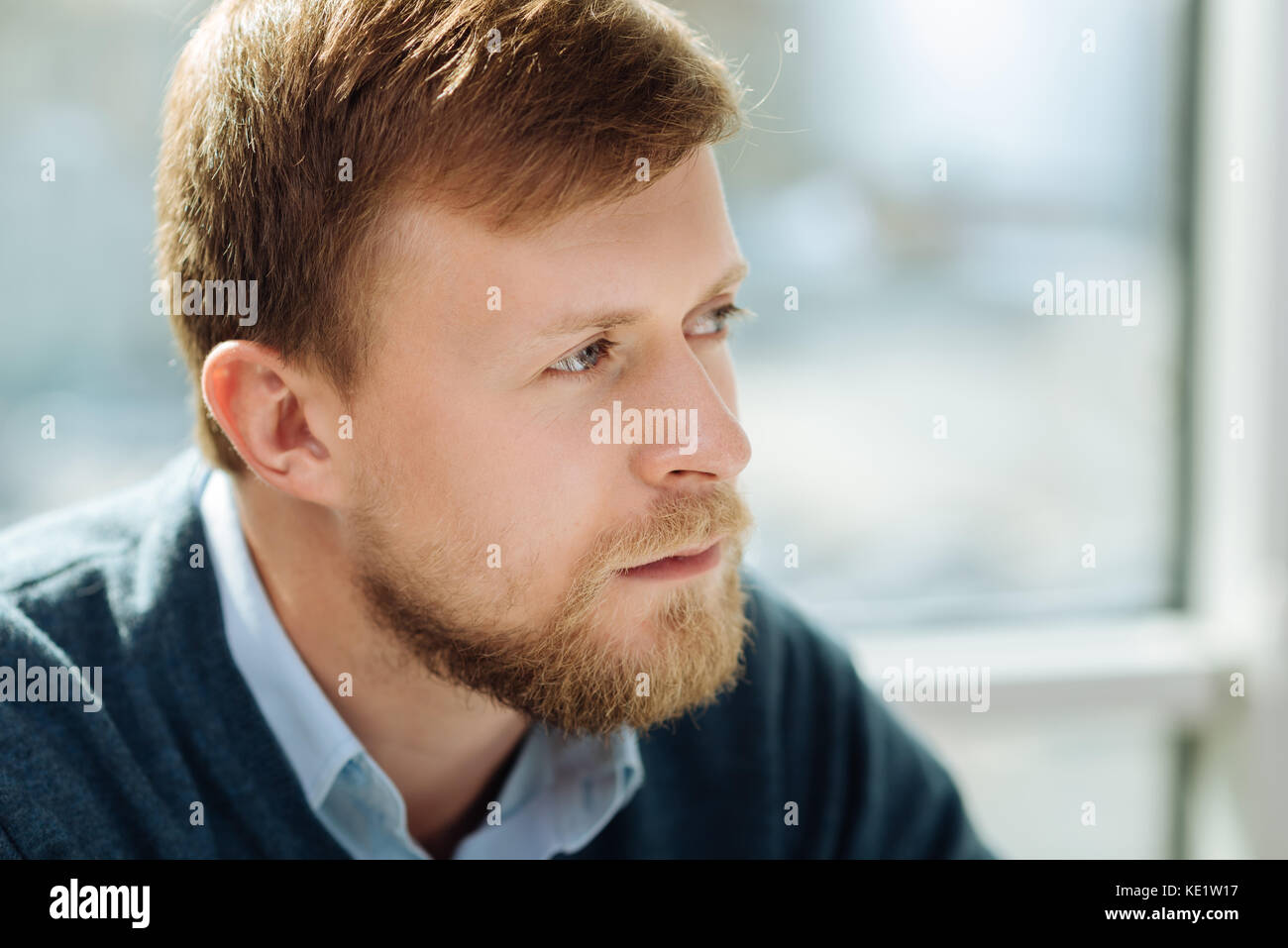 Attractive office worker being deep in thoughts Stock Photo - Alamy