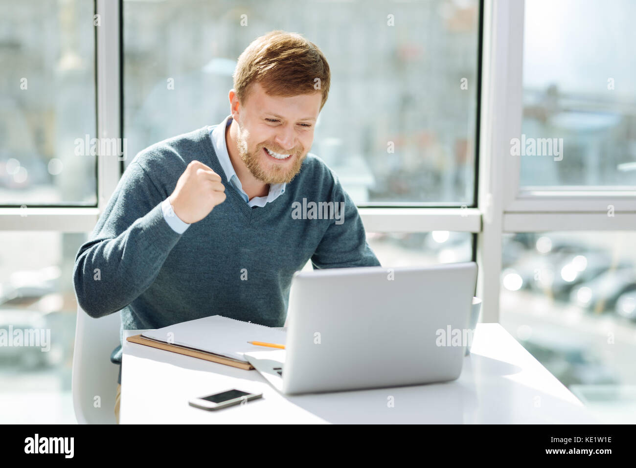 Happy male person showing his emotions Stock Photo - Alamy