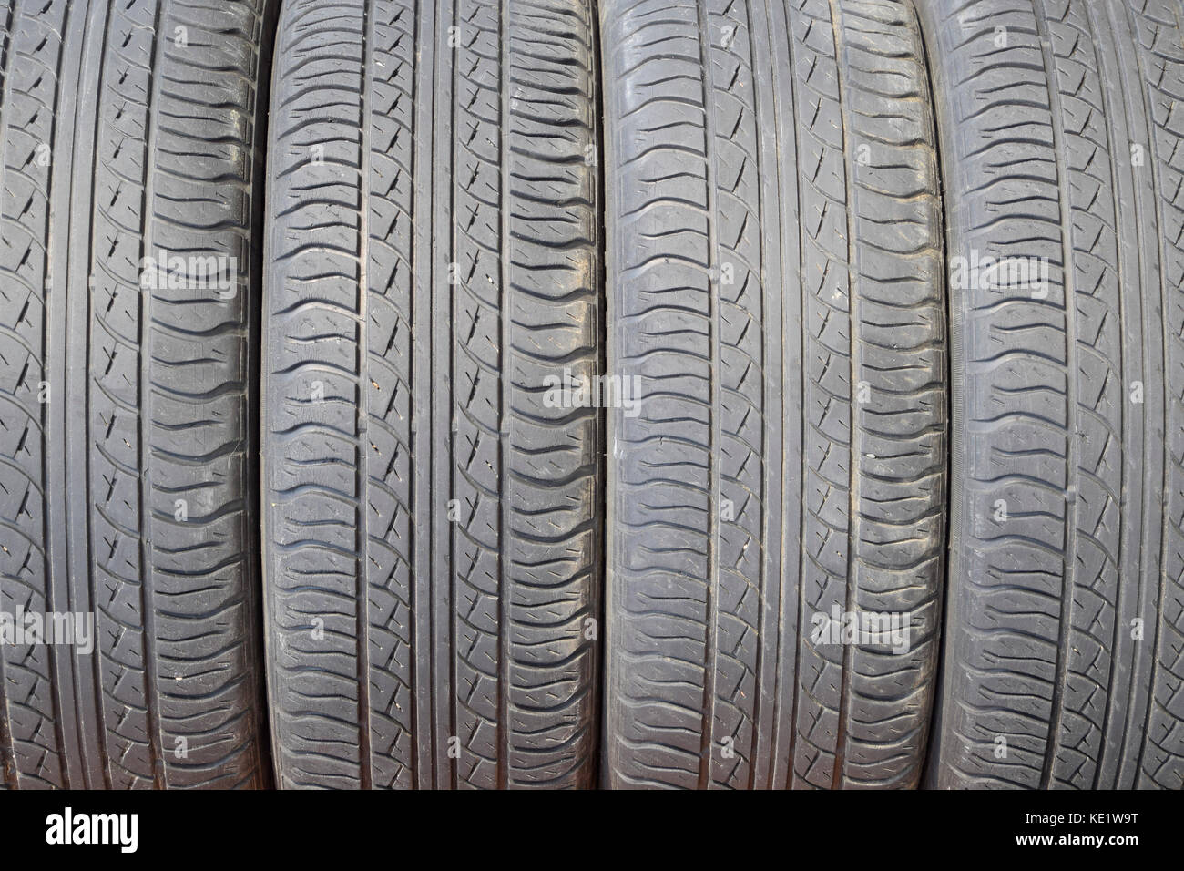 The background of the tread pattern of the car wheel. Rubber tires ...