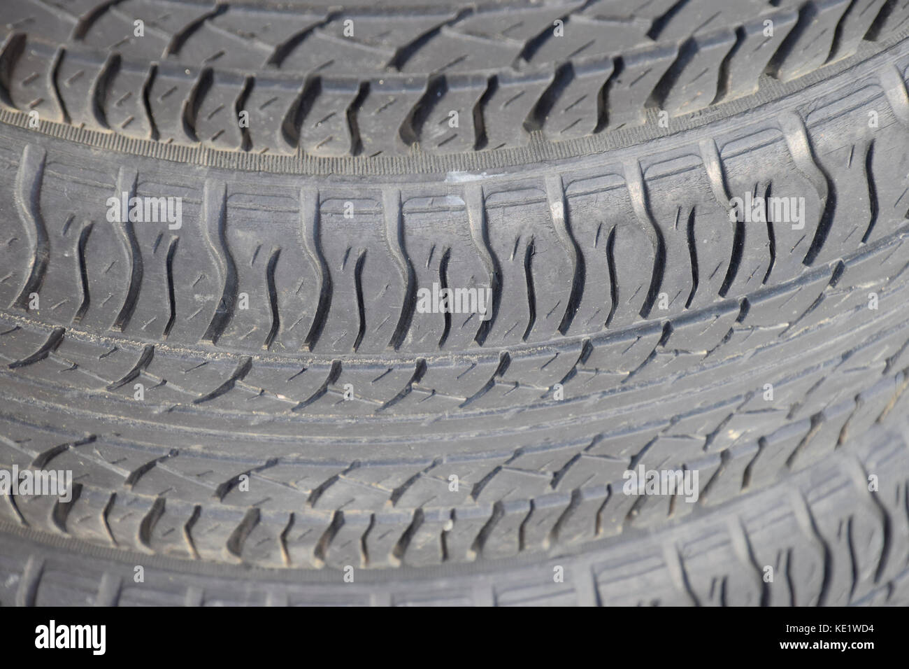 The background of the tread pattern of the car wheel. Rubber tires ...