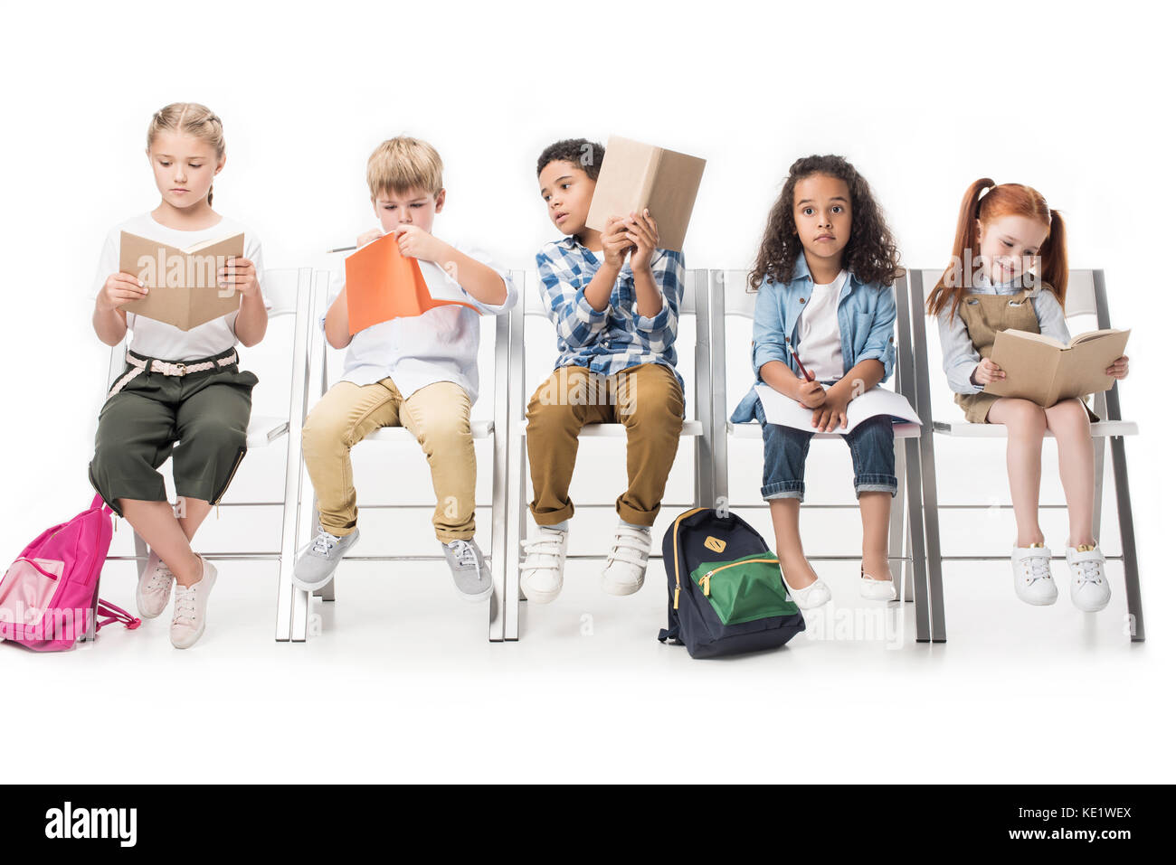 Kids reading school children with books girl and boy hi-res stock ...