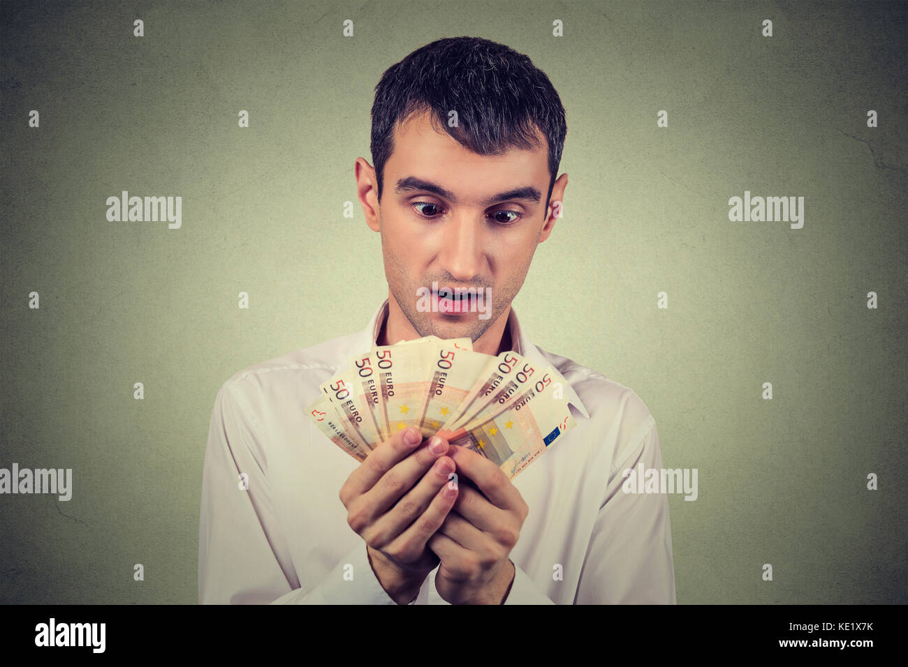 Handsome young man wealth hi-res stock photography and images - Alamy