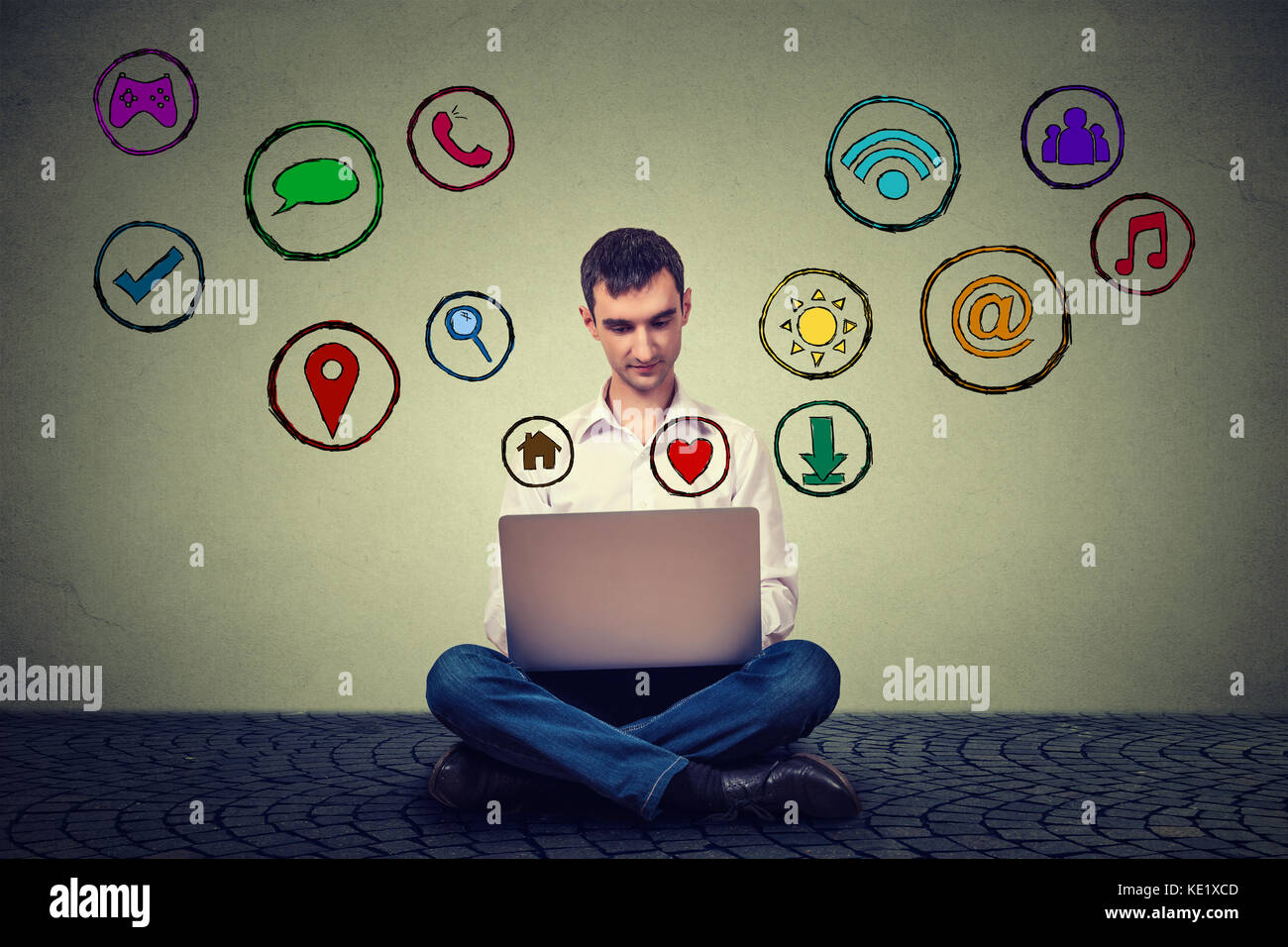 man working on laptop using social media application. Building ...