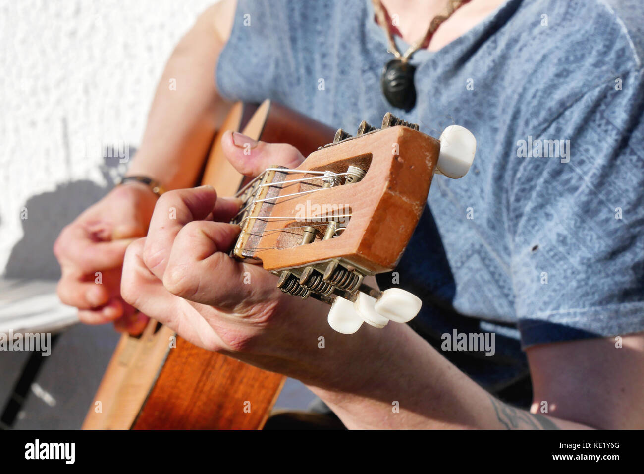 a close up of the guitarist's hands Stock Photo - Alamy