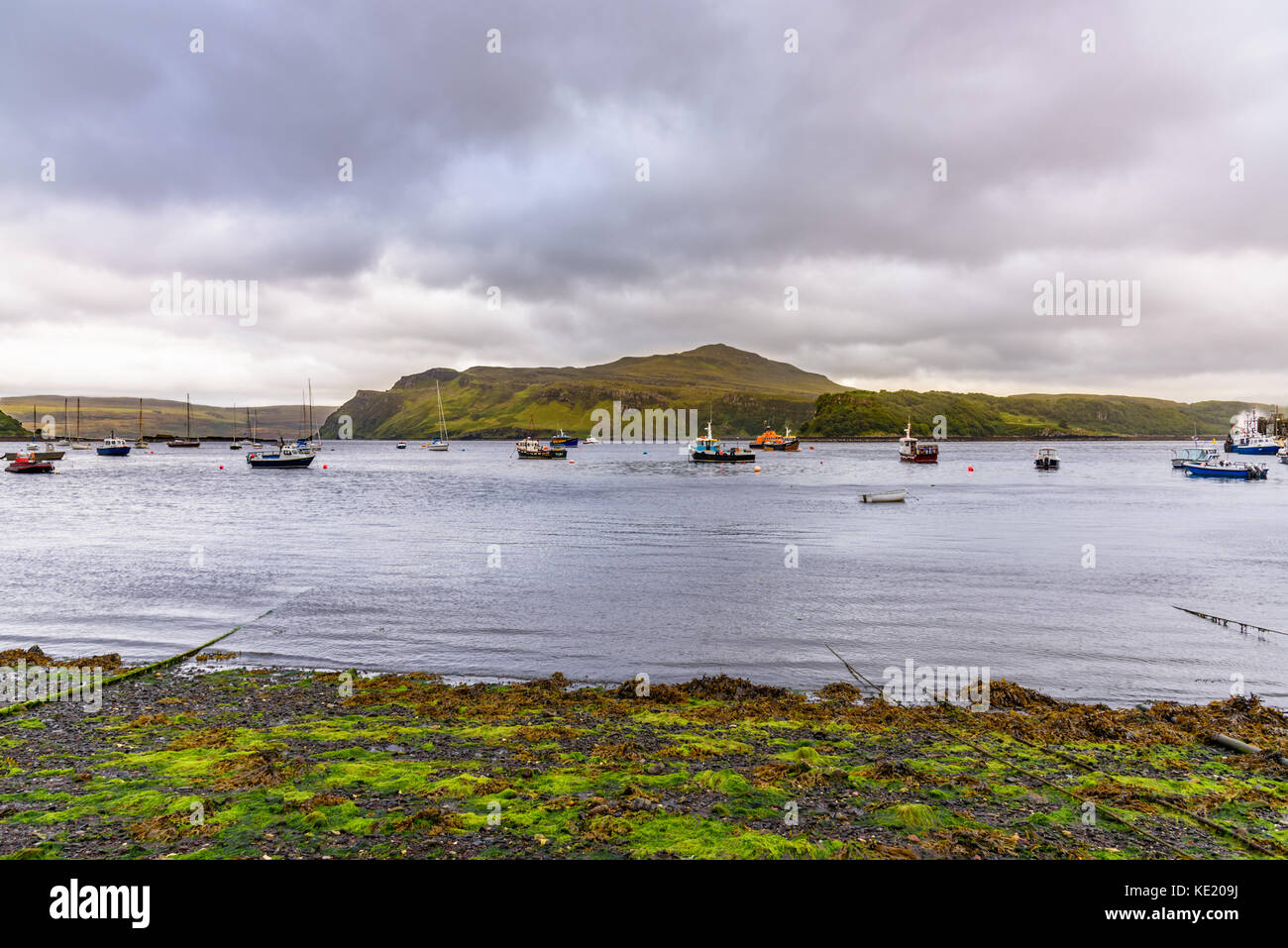 PORTREE, SCOTLAND - AUGUST 11, 2017 - View, with some boats, of Portree ...