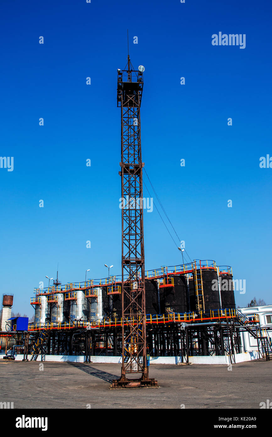 Old and rusty lighting tower at an oil refinery in Russia Stock Photo ...