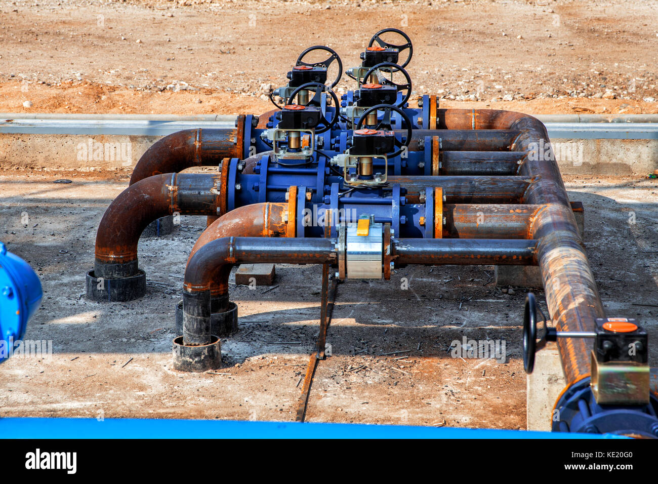 steel pipes and valves on industrial enterprise Stock Photo - Alamy