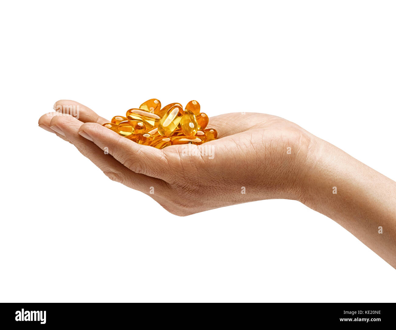 Hand holding capsules Cut Out Stock Images & Pictures - Alamy