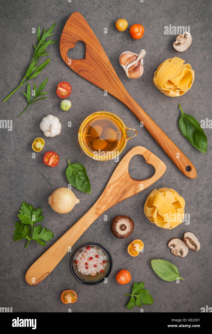 Italian foods concept and menu design. Fettuccine with wooden spatula ...