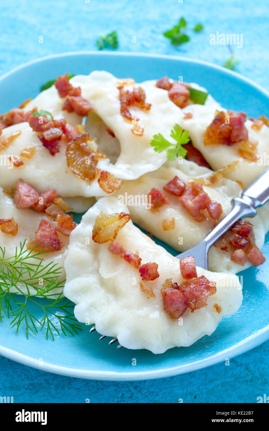 Fried piroggi with bacon and onion Stock Photo - Alamy
