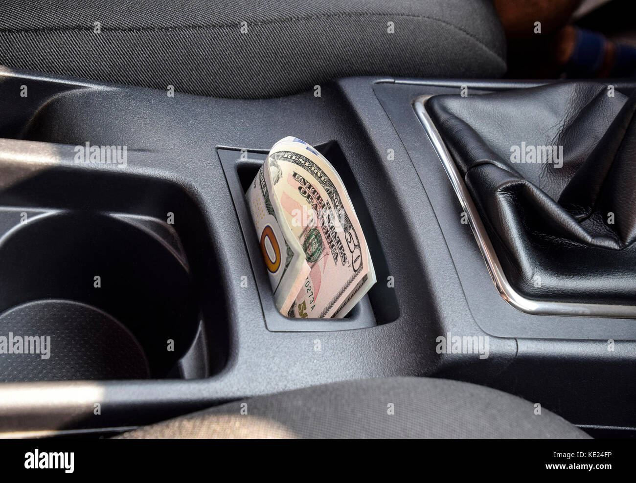 Several banknotes American dollars lie in the niche of the central ...