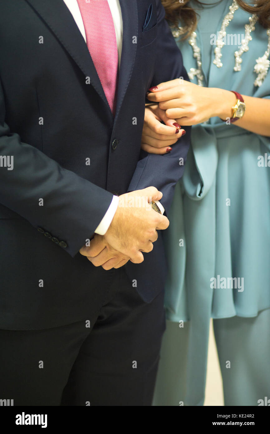 Young bride and groom in formal weddings business suit and casual dress ...