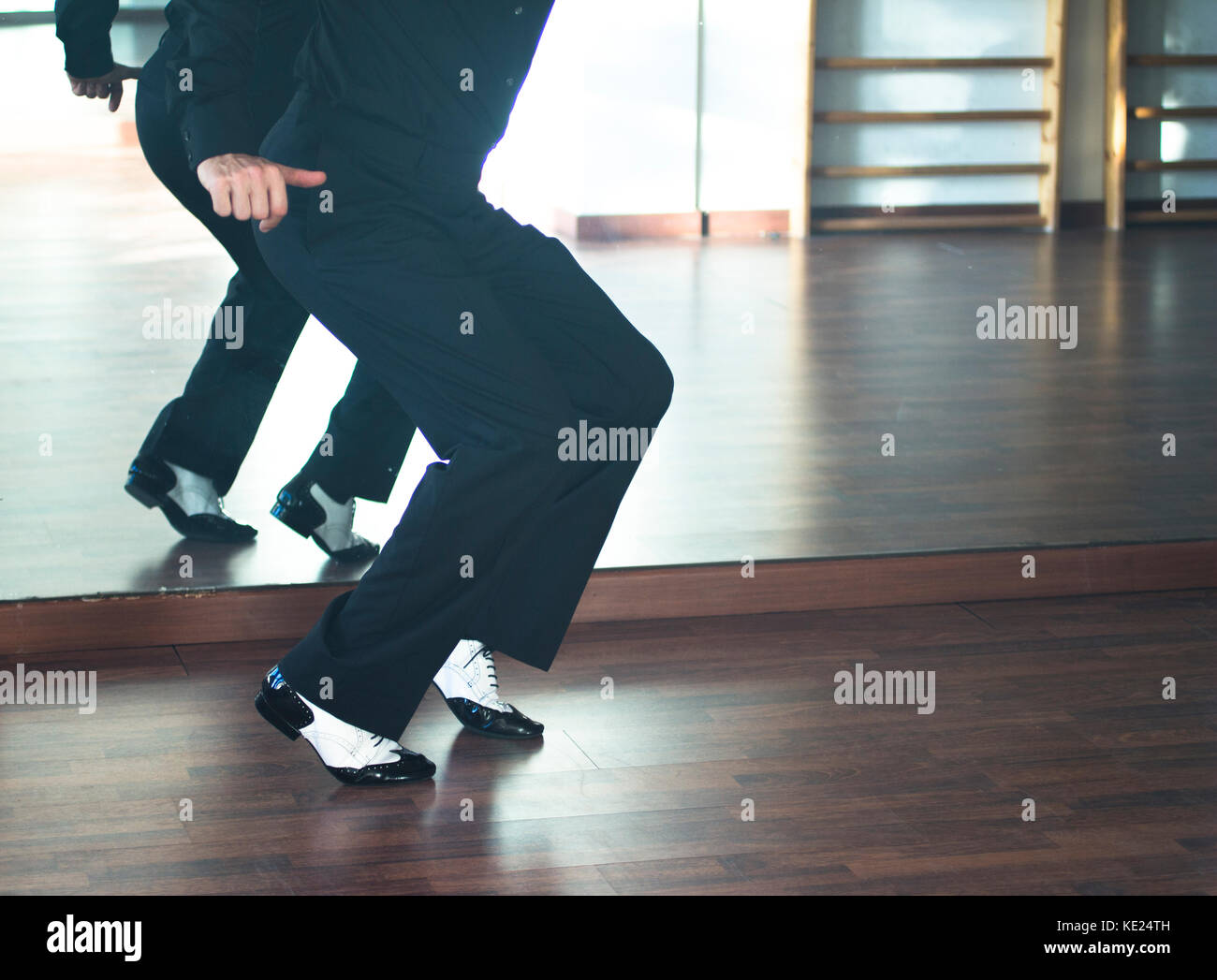 Ballroom dance male dancer and teacher in studio school dancing in ...